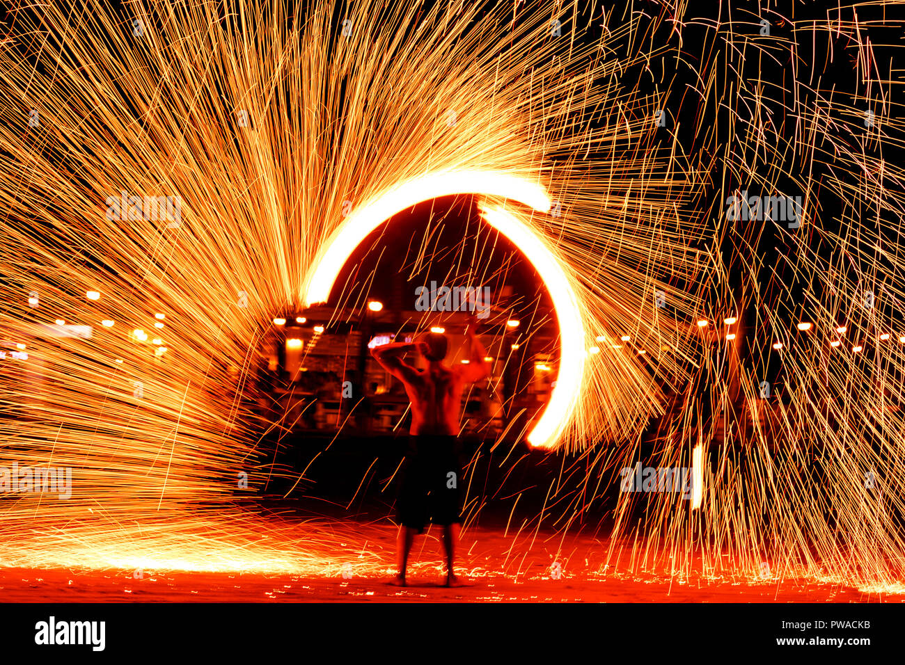 fire dance on beach near the sea , the east coast of thailand Stock ...