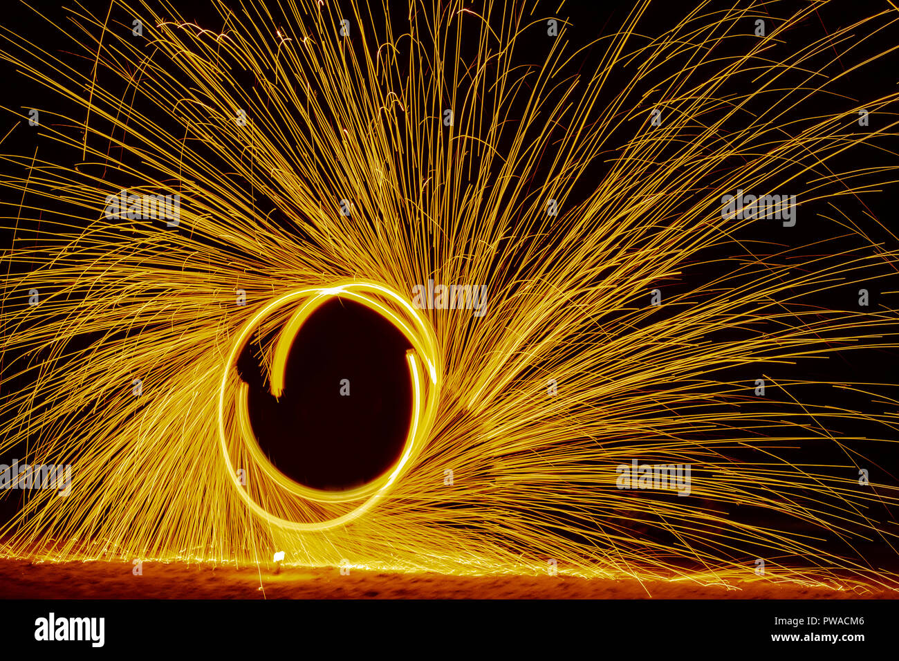 fire dance on beach near the sea , the east coast of thailand Stock ...