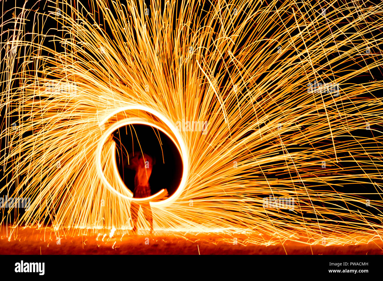 fire dance on beach near the sea , the east coast of thailand Stock ...