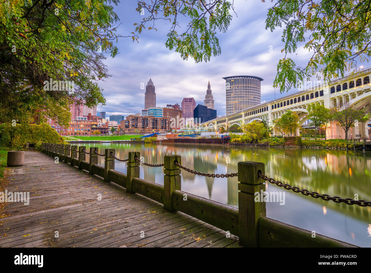 Cleveland, Ohio, USA downtown skyline on the Cuyahoga River at dusk ...