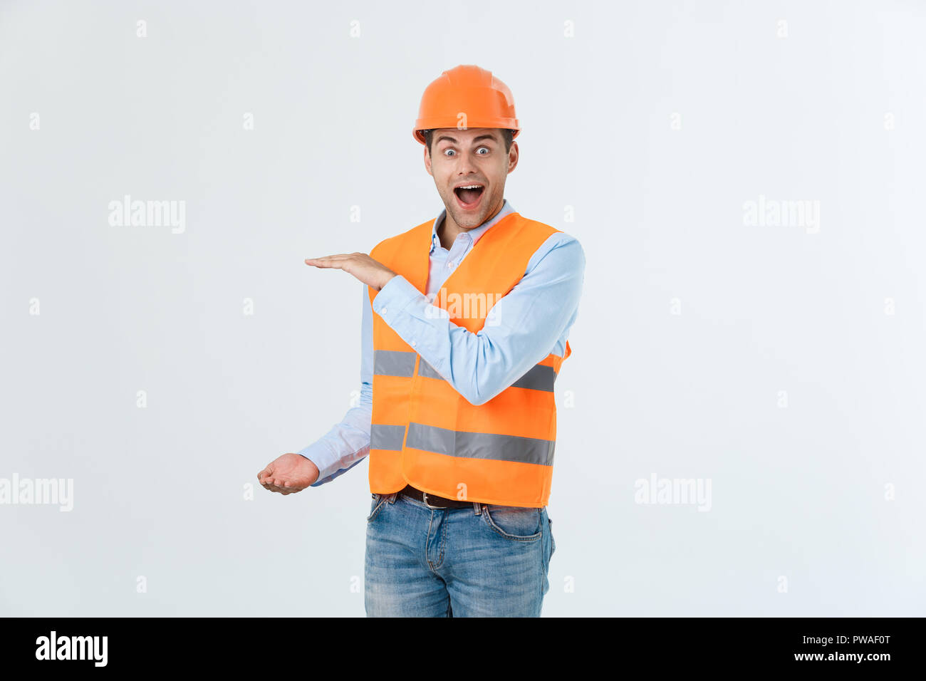 engineer man showing hand on side showing size of product Stock Photo ...