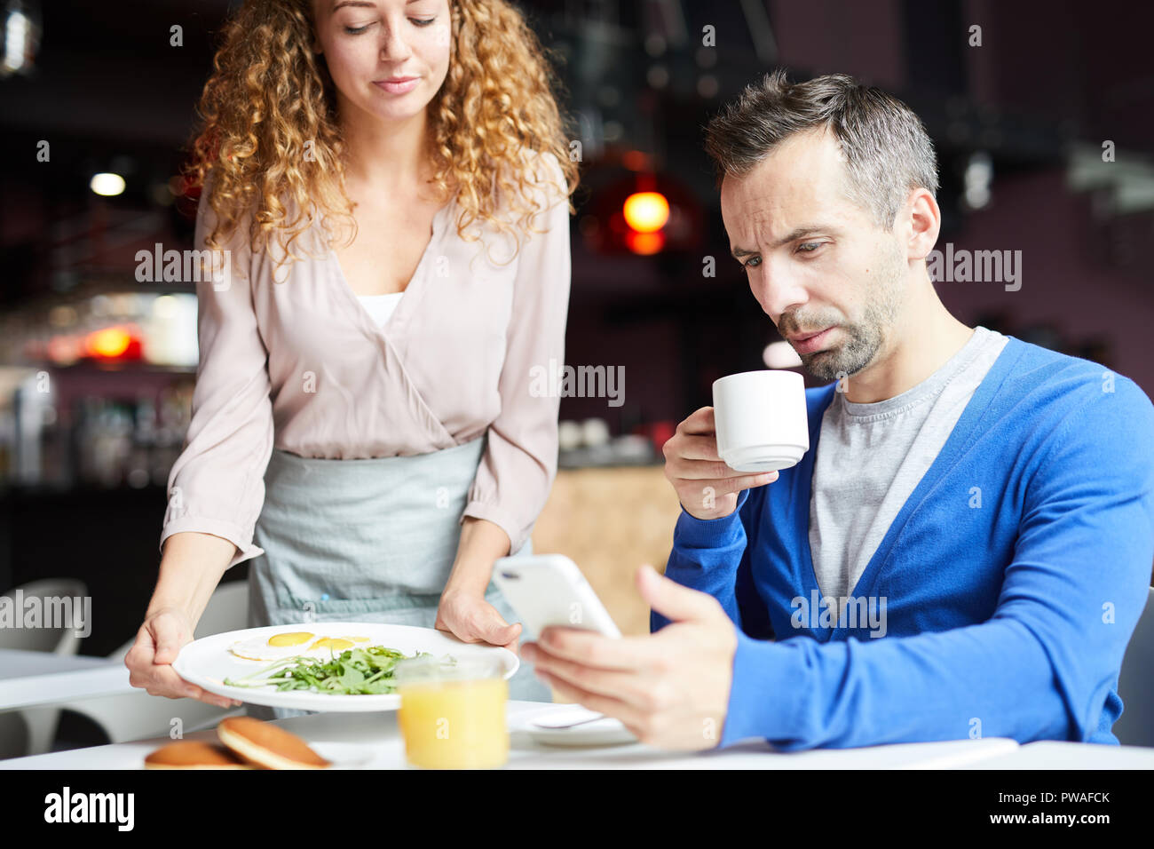 Bringing tea hi-res stock photography and images - Alamy