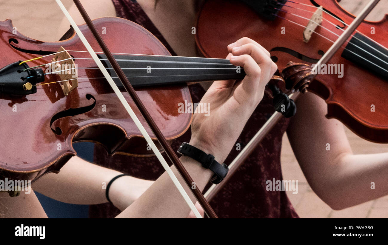 Classical Musicians playing outside on downtown pedestrian mall Stock ...