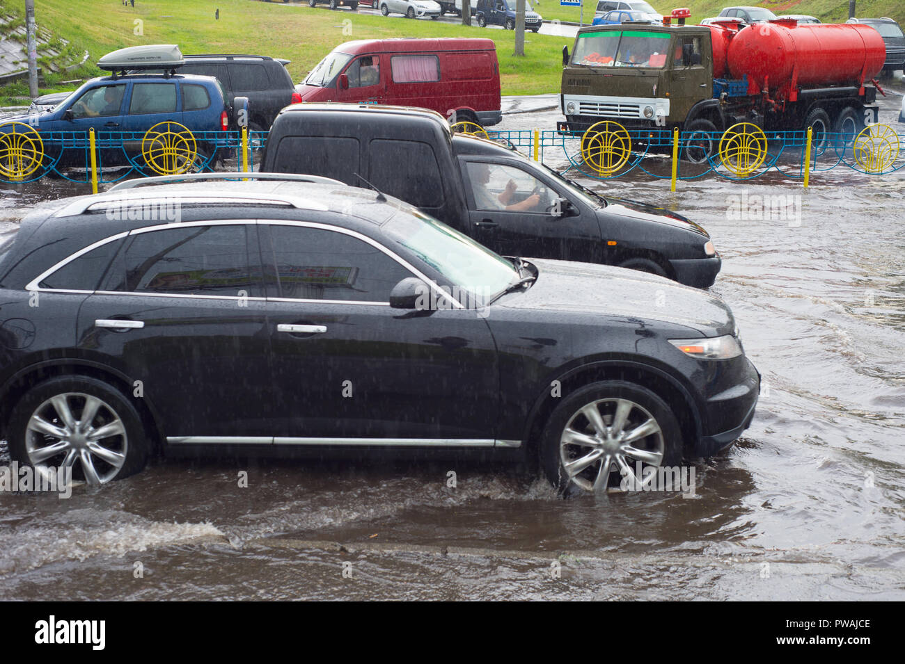 Car driving in rain storm hi-res stock photography and images - Alamy