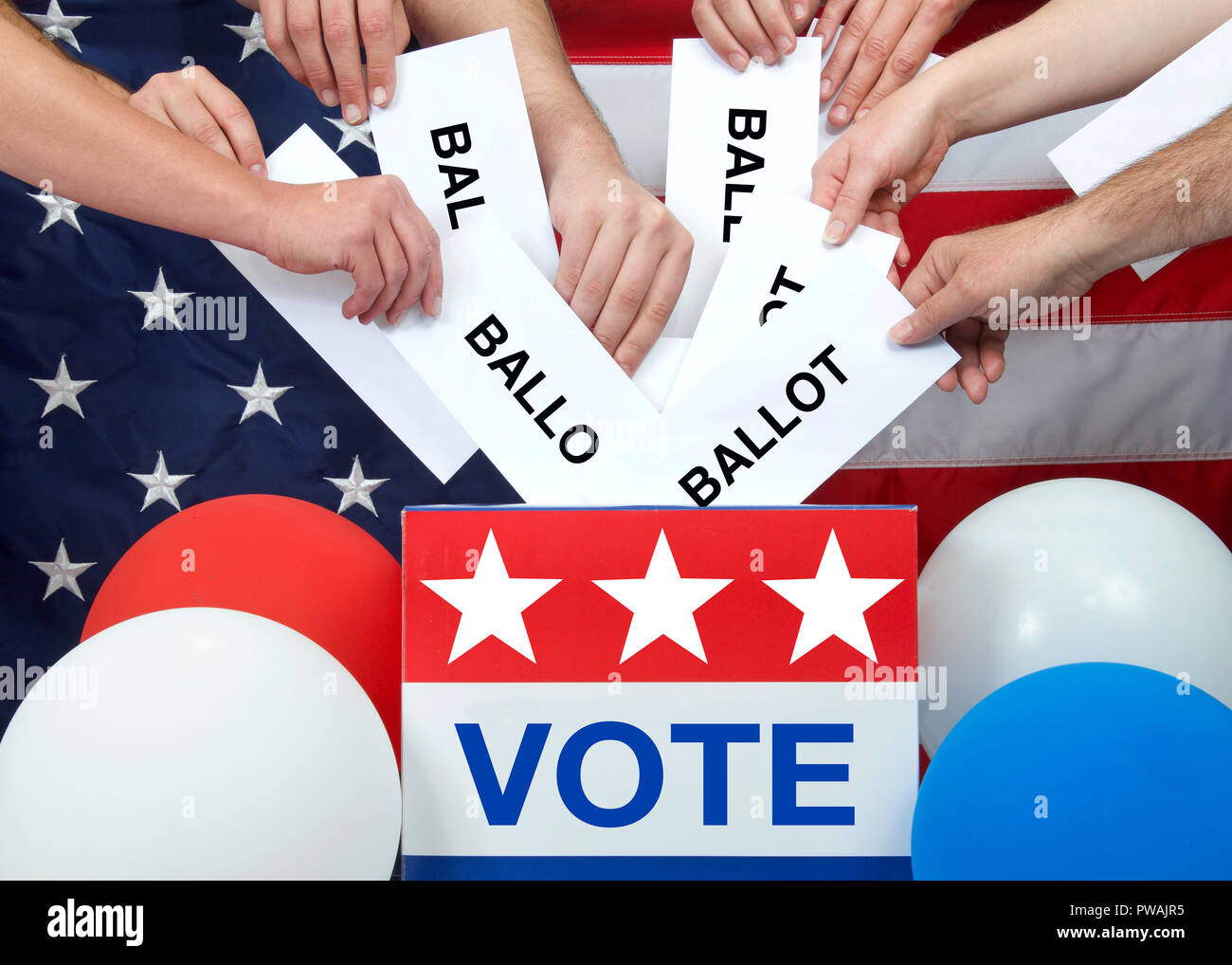 Voting hands up hi-res stock photography and images - Alamy