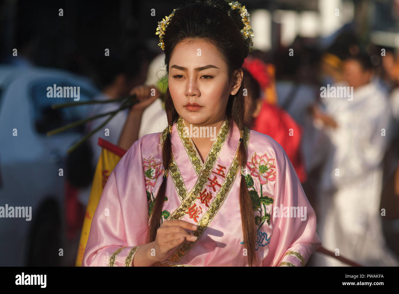 A female Mah Song or spirit medium channeling goddess Kuan Yin; in a ...
