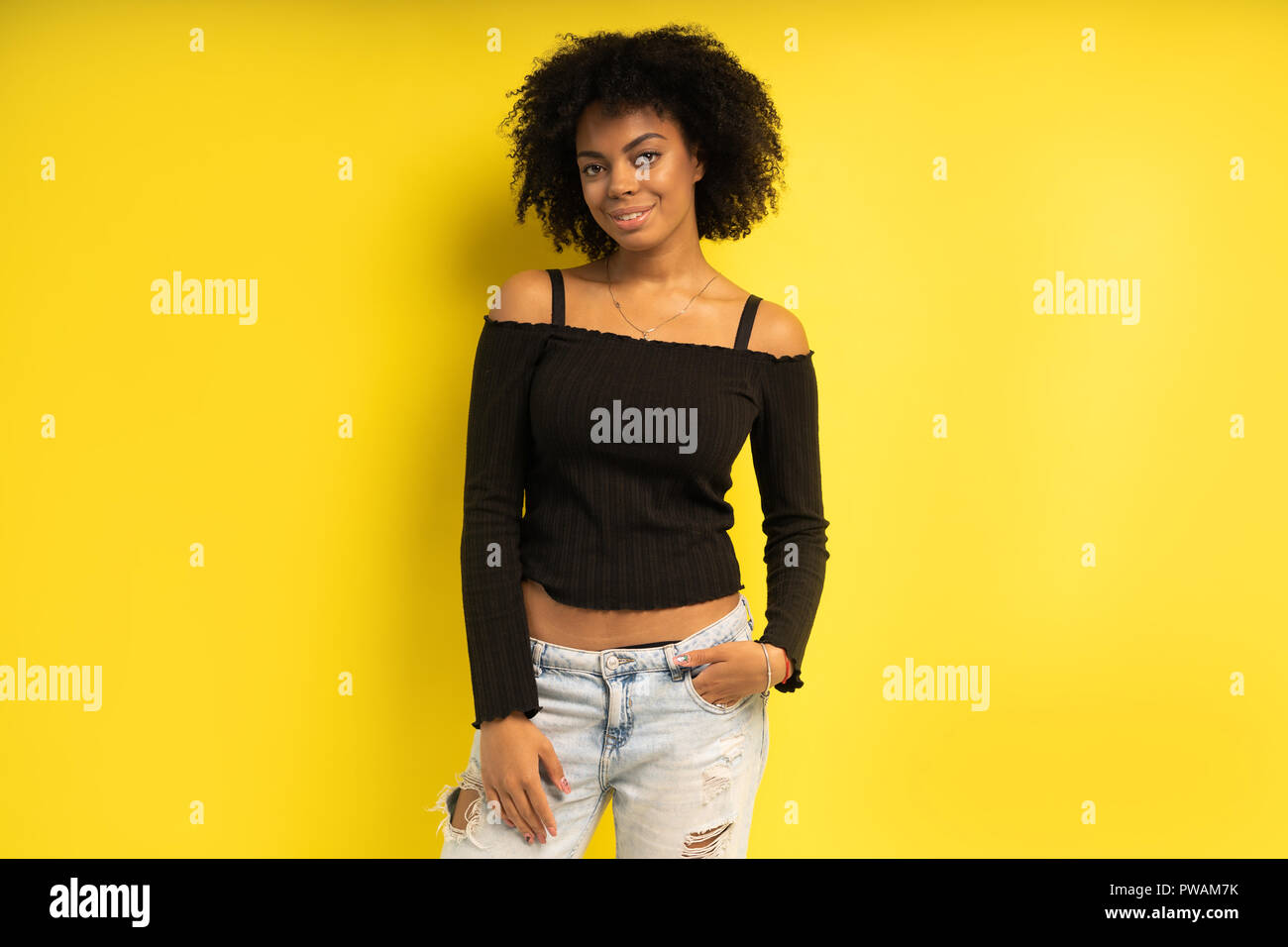 Beautiful african american female model posing in studio Stock Photo ...