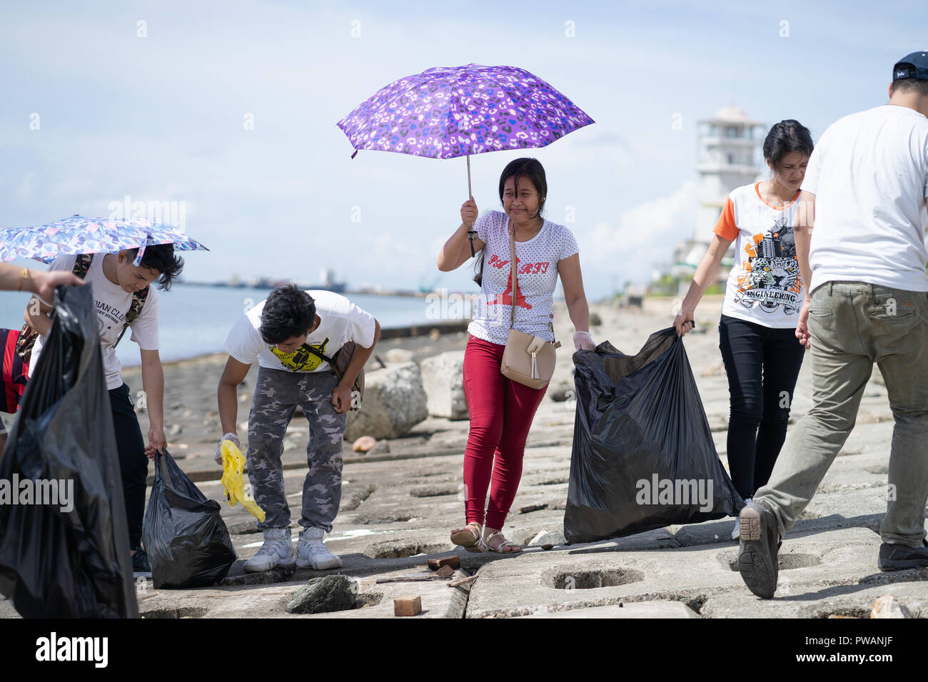 A group of Filipino students within Cebu City,Philippines conducting ...