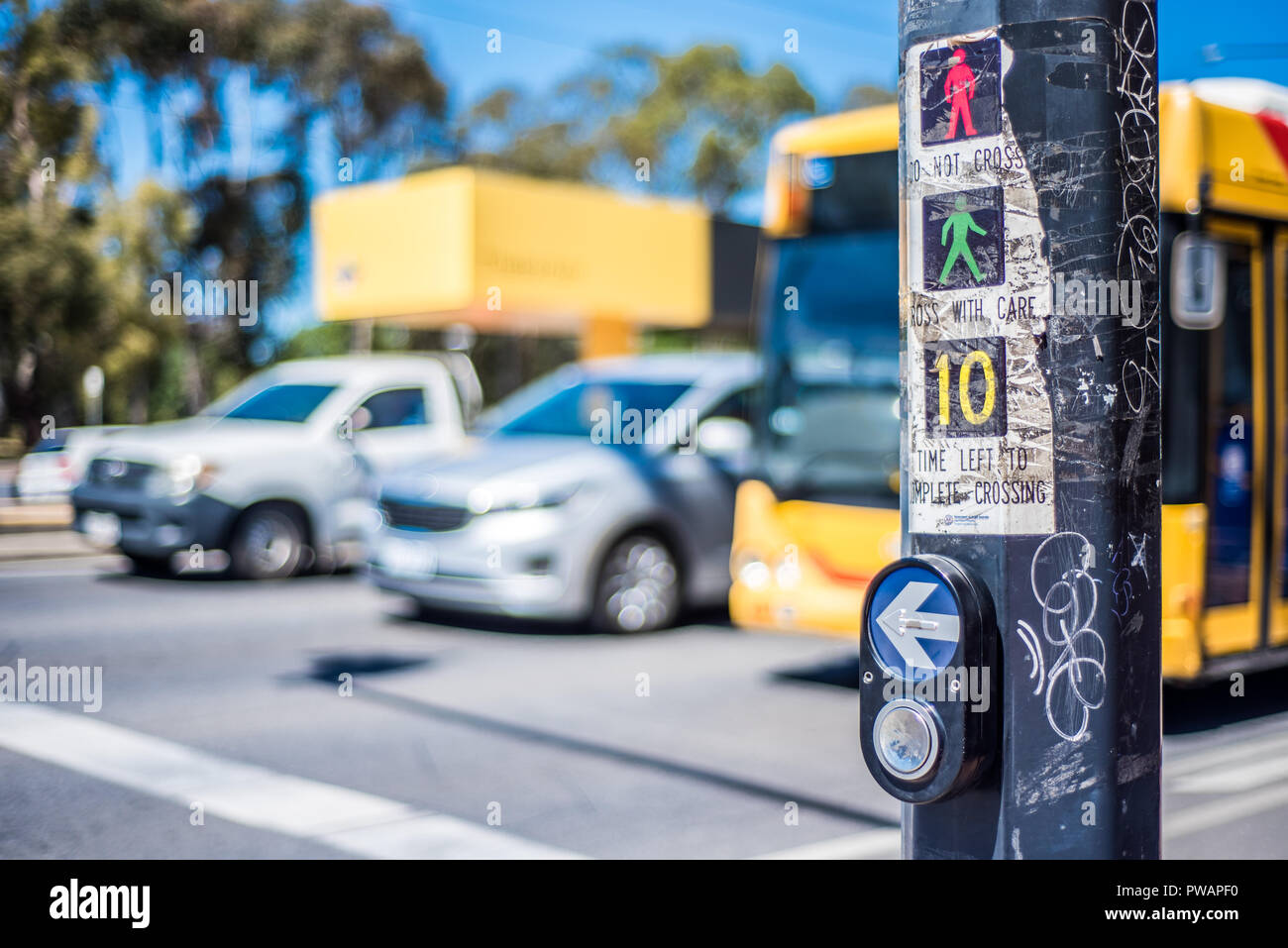 People crossing traffic signal hi-res stock photography and images - Alamy