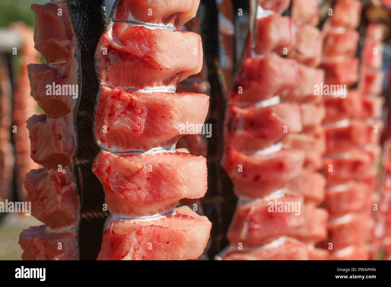 Salmon drying on racks hi-res stock photography and images - Alamy