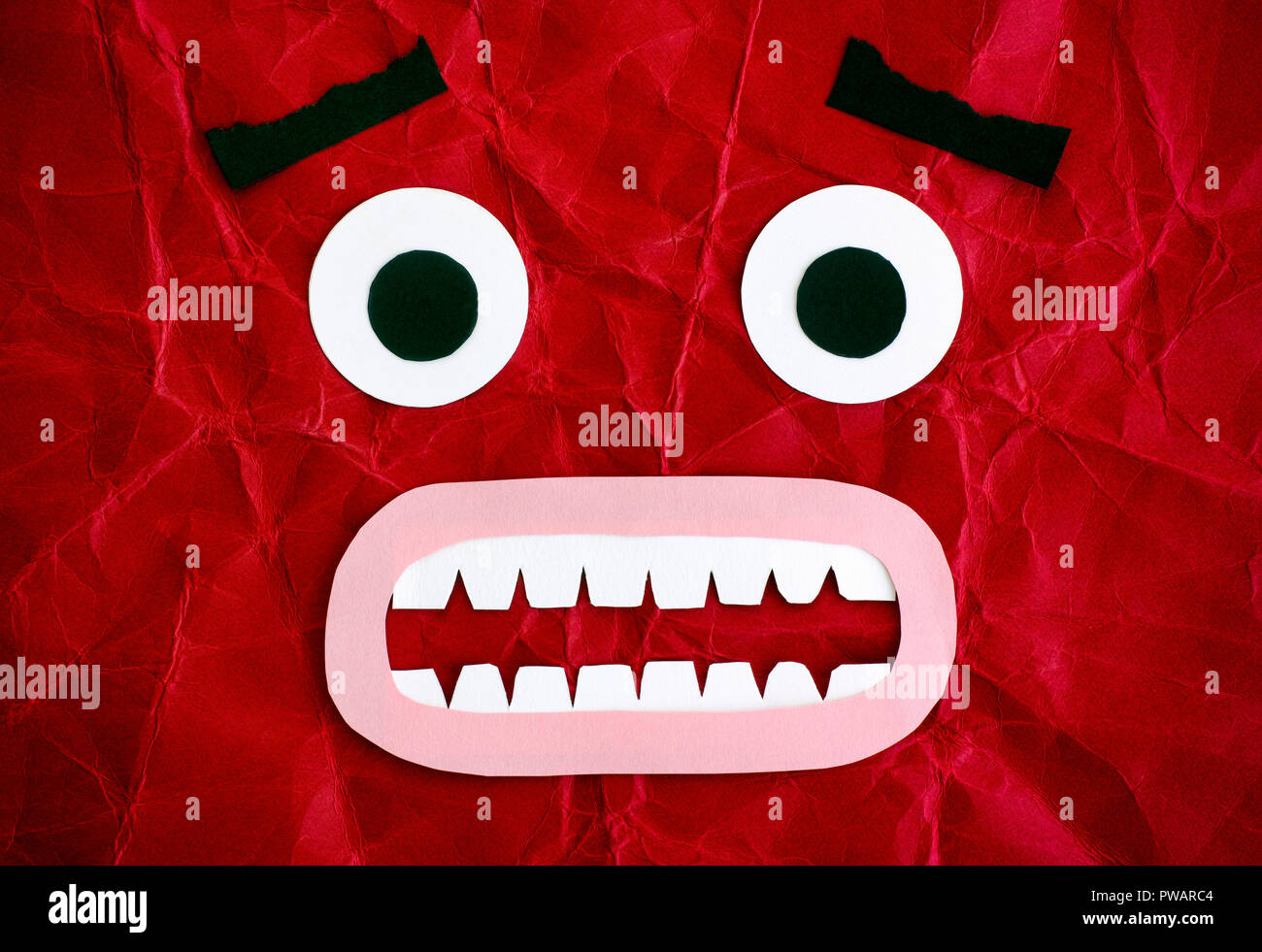 Scared character. Emotional face made from paper. Red background Stock ...