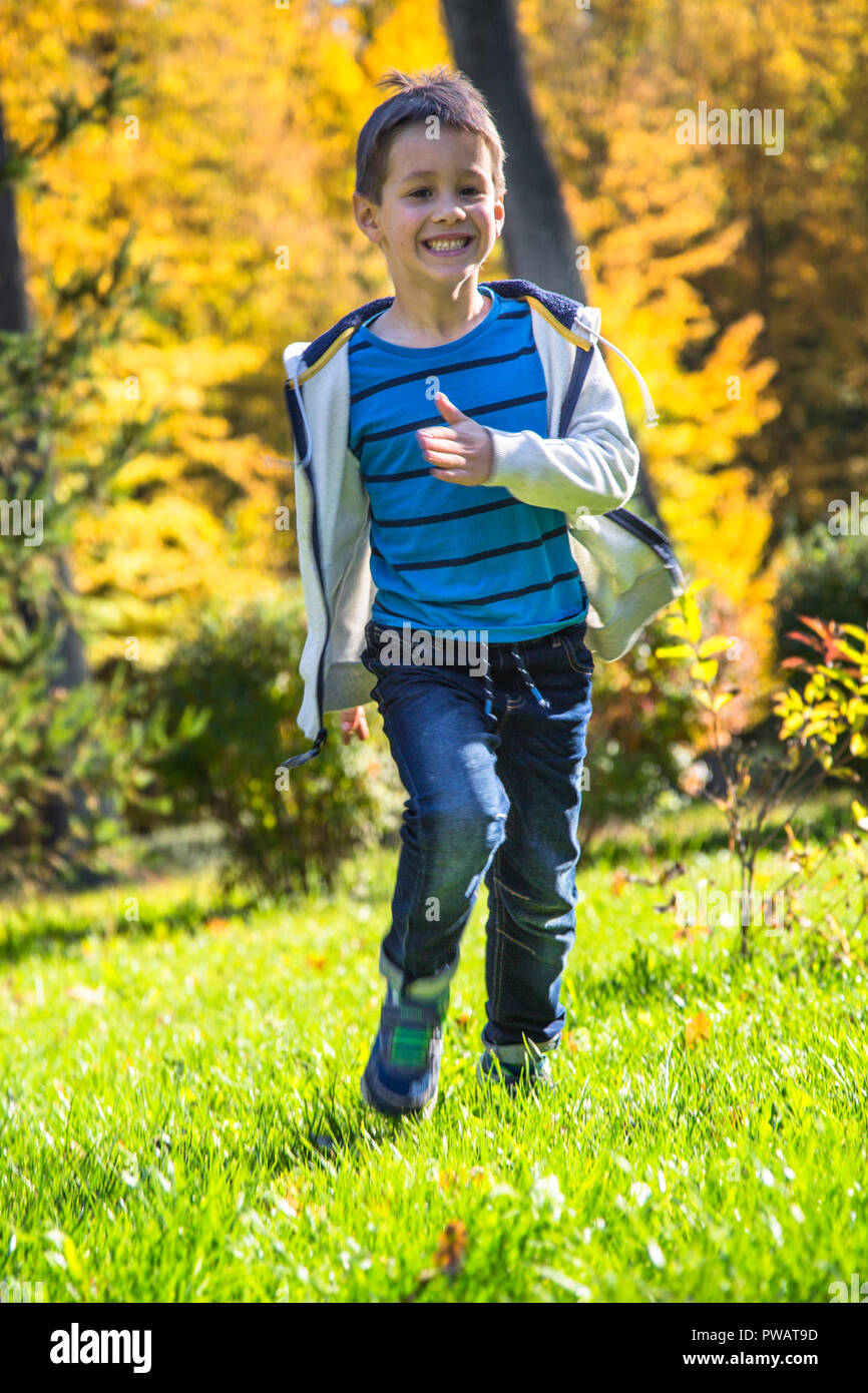 Run park boy hi-res stock photography and images - Alamy