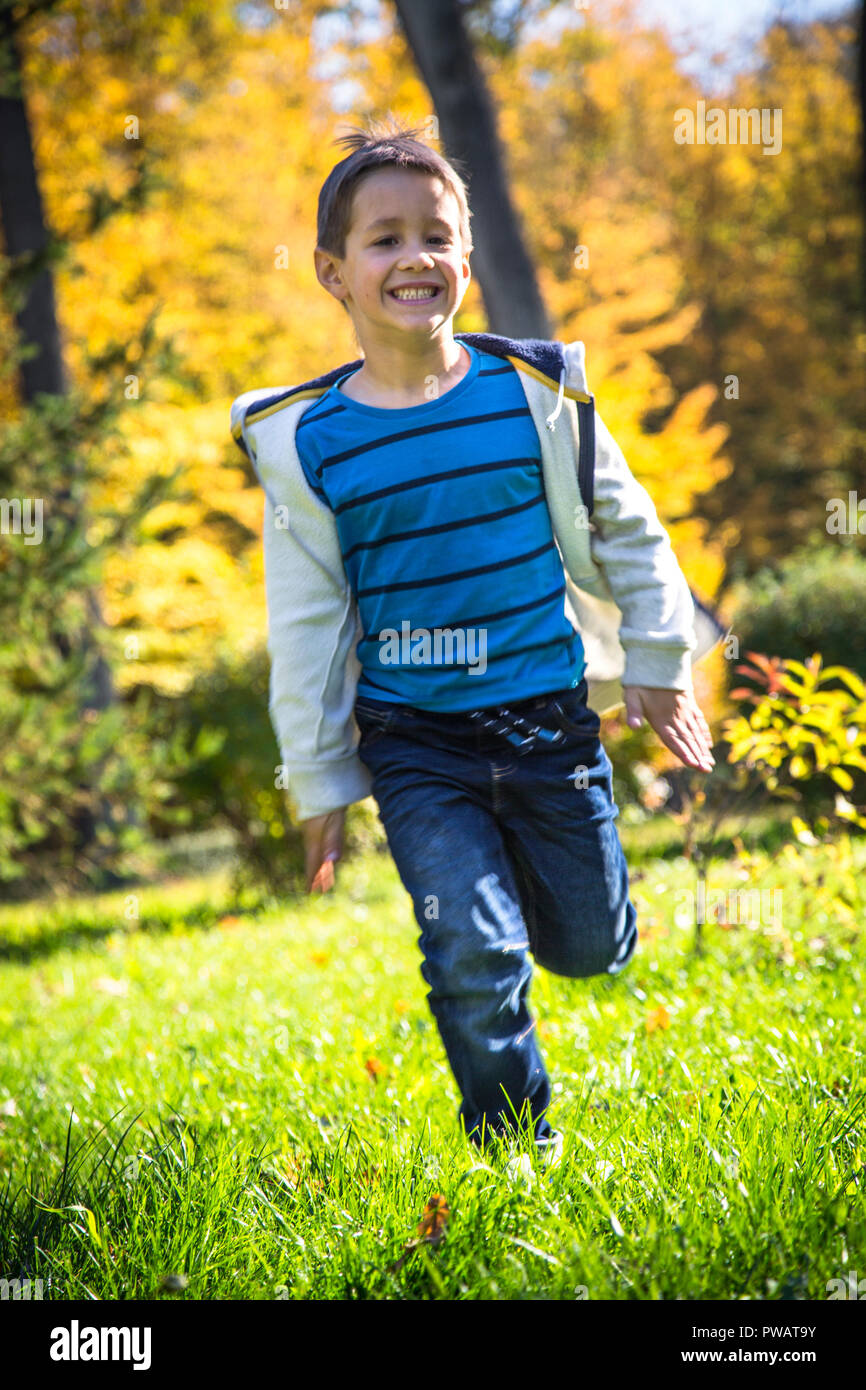 Boy run park hi-res stock photography and images - Alamy