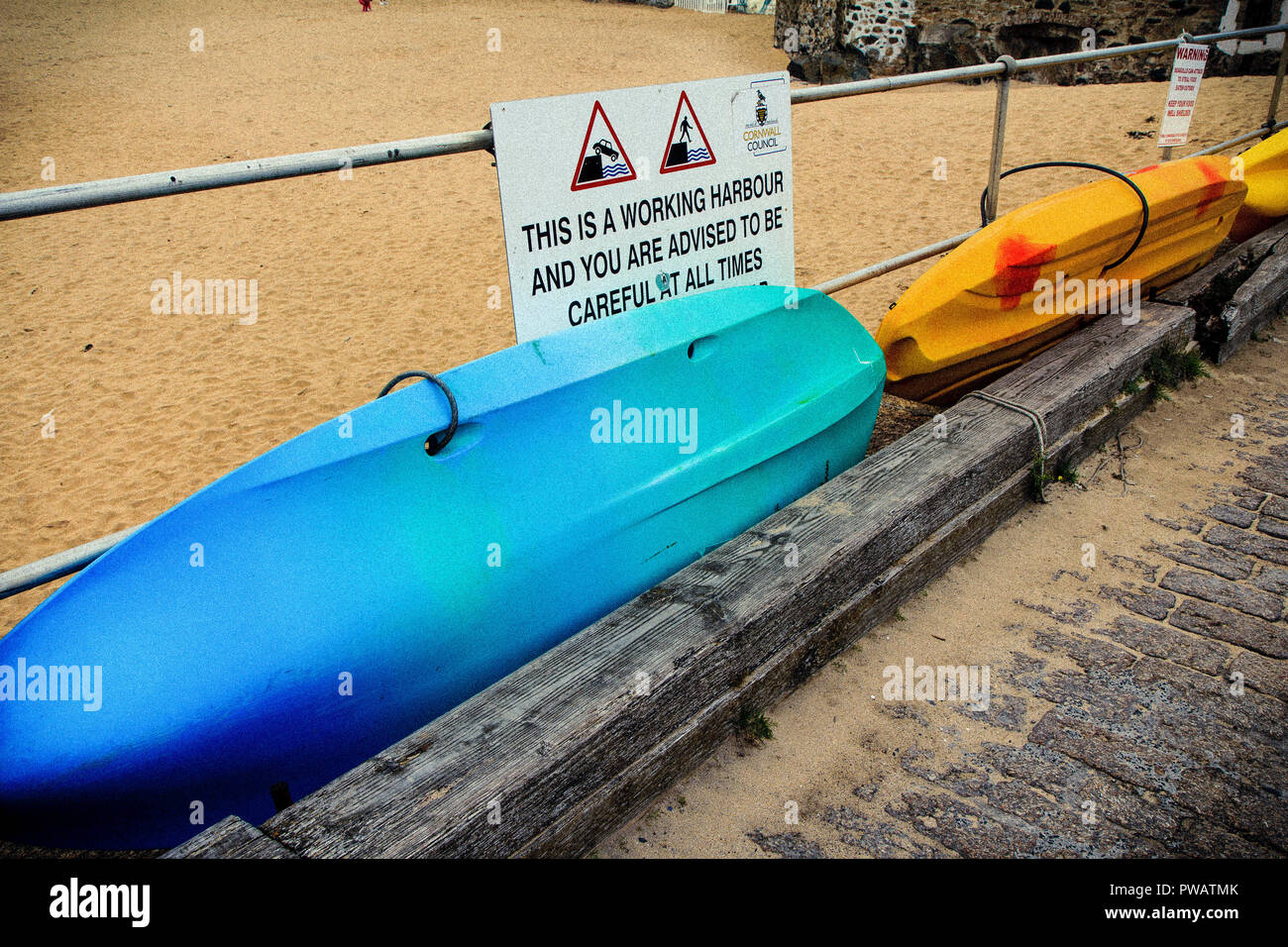 Colourful Surfboards in harbour of St. Ives, Cornwall, UK Stock Photo ...