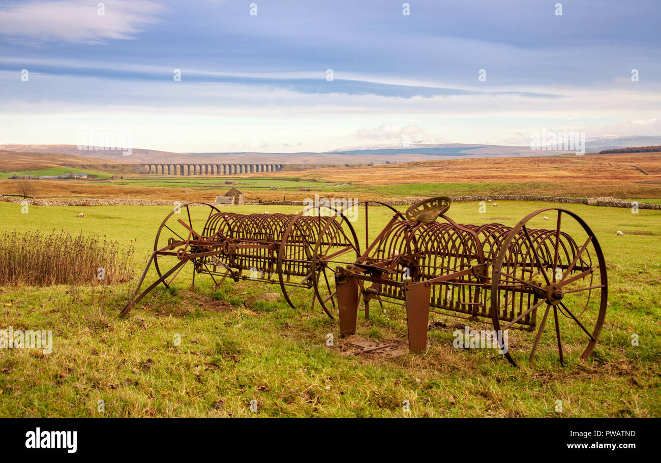 Old rusty farm machinery near the Ribblehead Viaduct, Yorkshire Dales ...