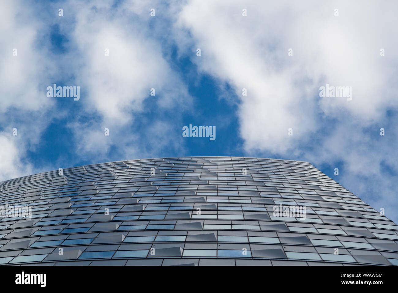 Wide angle abstract background view of steel light blue high rise ...
