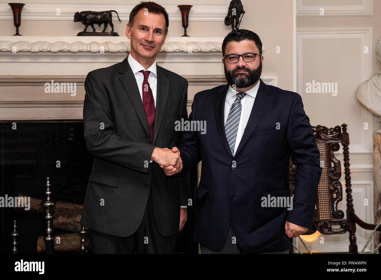 Foreign Secretary Jeremy Hunt poses for a photograph with Romanian ...