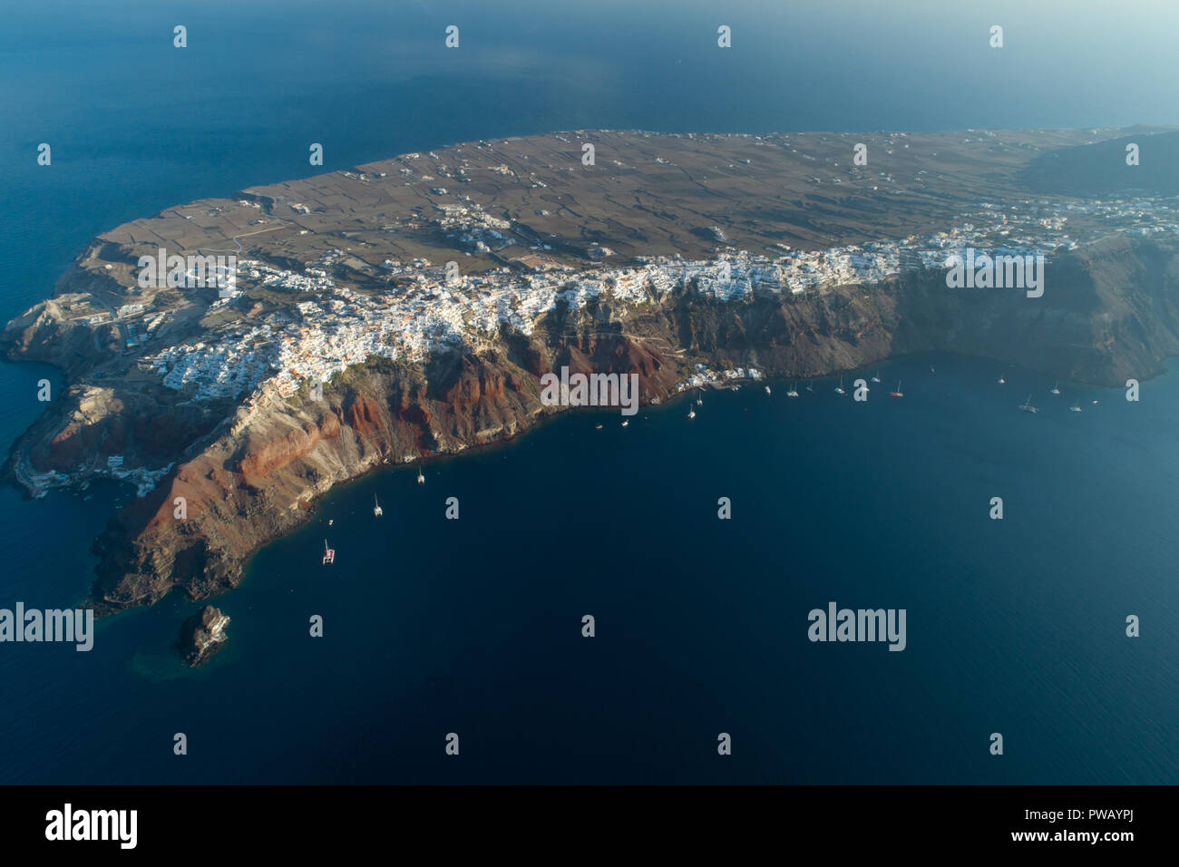 Aerial view flying over city of Oia on Santorini Greece Stock Photo - Alamy