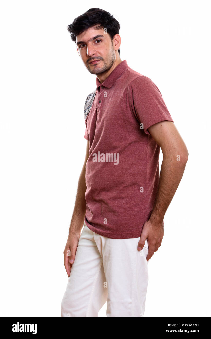 Studio shot of young Persian man standing Stock Photo - Alamy