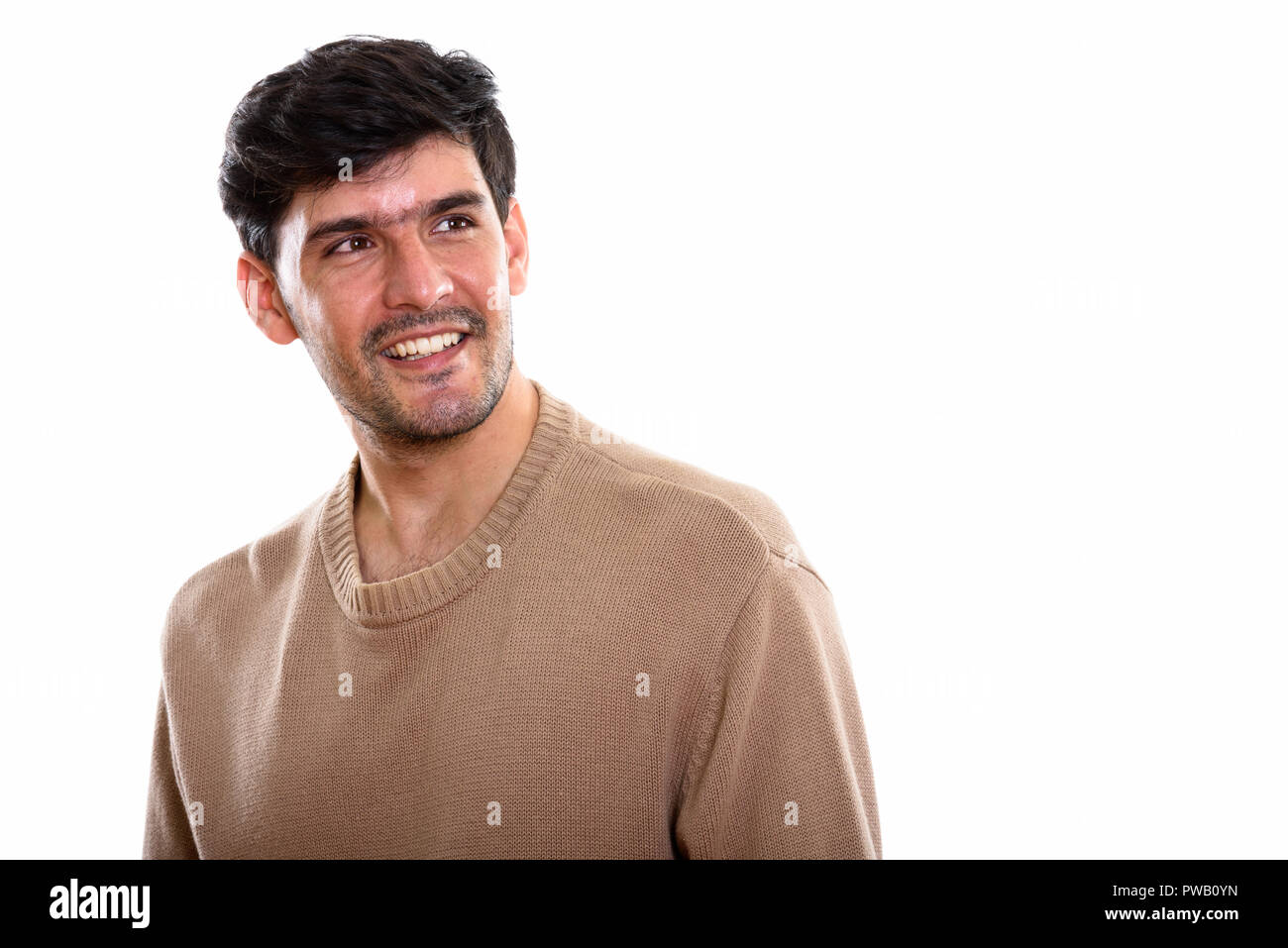 Thoughtful happy persian man hi-res stock photography and images - Alamy