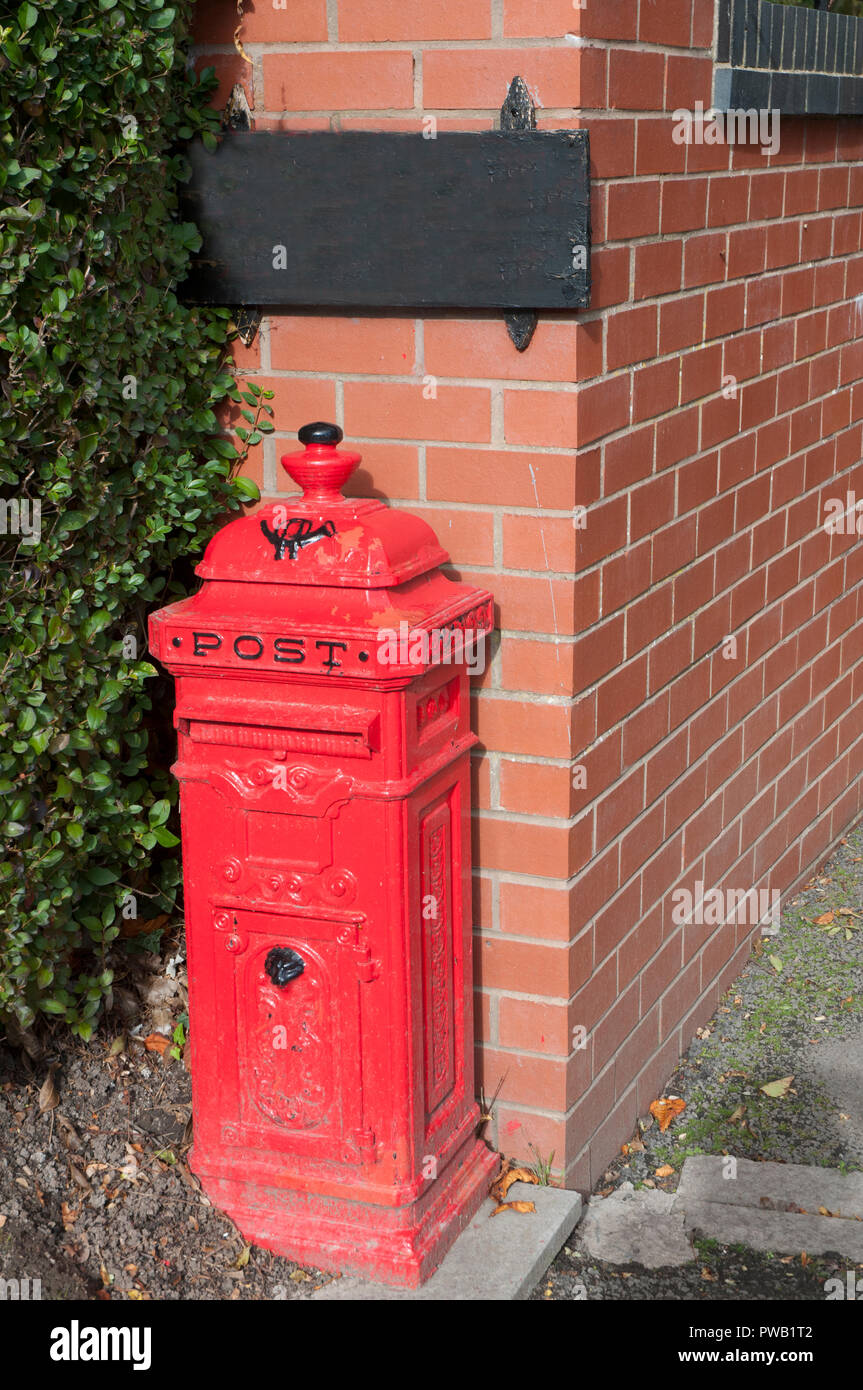 Iron period letterbox outside property Stock Photo - Alamy