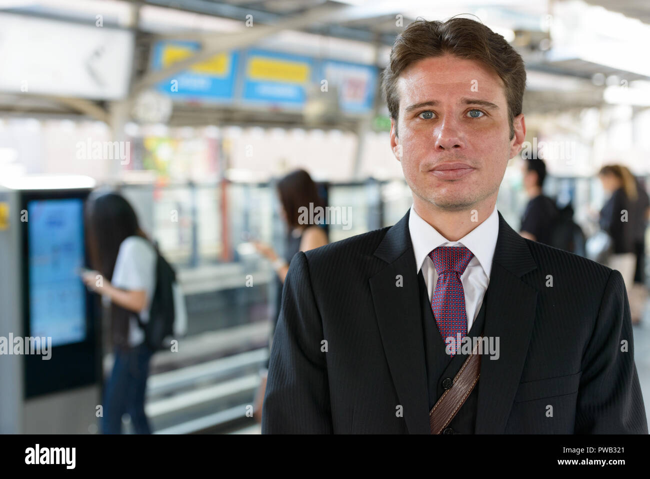 Portrait of businessman at train station in Bangkok Thailand Stock ...
