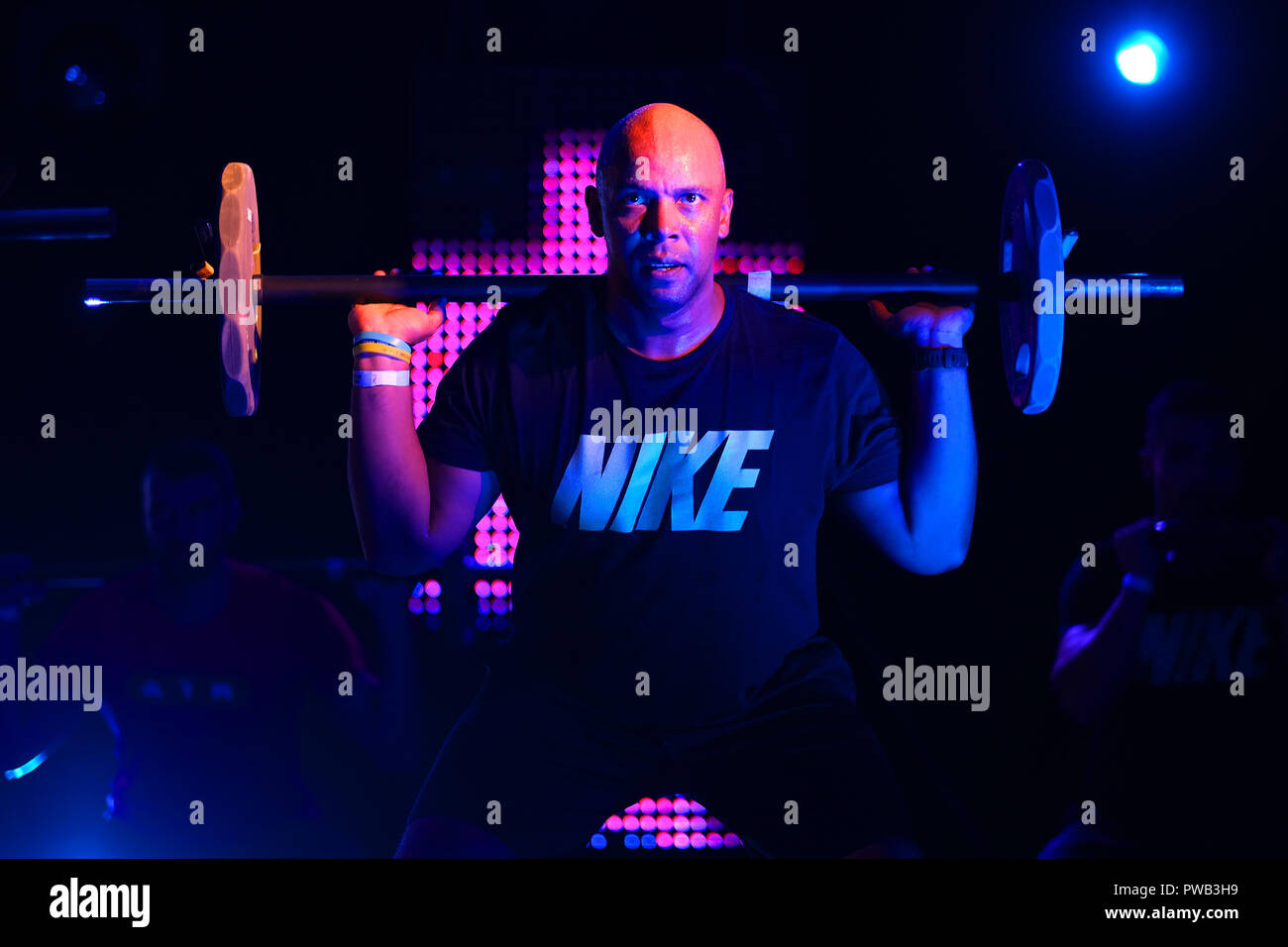 Male gym instructor colourful hi-res stock photography and images - Alamy