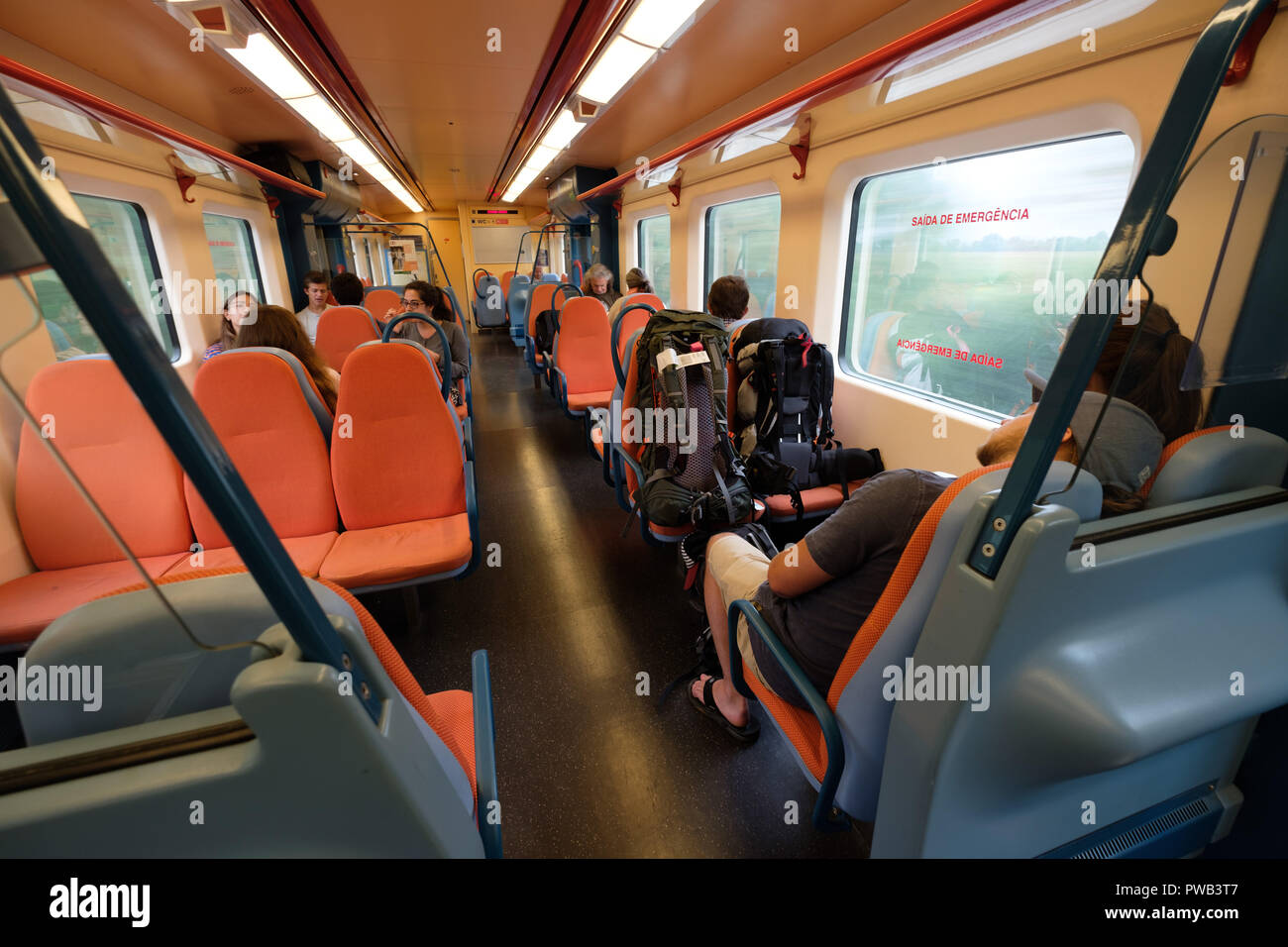 Passengers aboard a moving train Stock Photo - Alamy