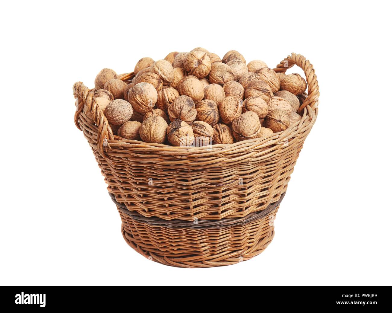 Collecting walnuts in a basket Stock Photo - Alamy