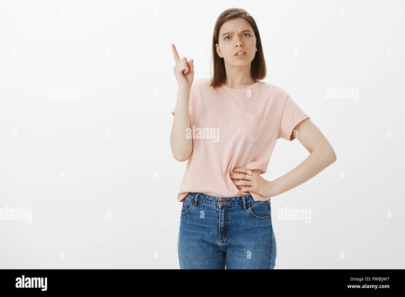 Moody girl bringing up first point why she mad. Portrait of attractive ...