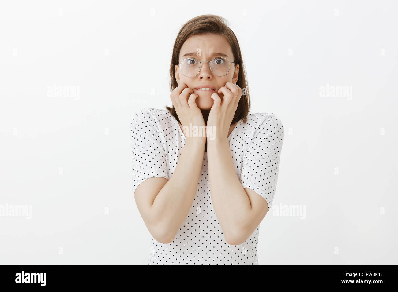 Paranoic and anxious girlfriend scared of consequences. Portrait of ...