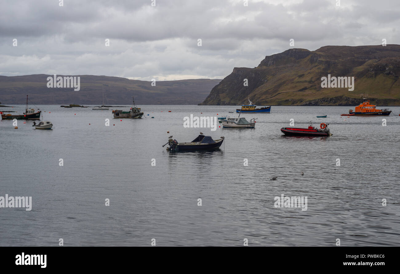Boats and ships in the old Harbor of Portree, Isle of Skye, Scotland ...