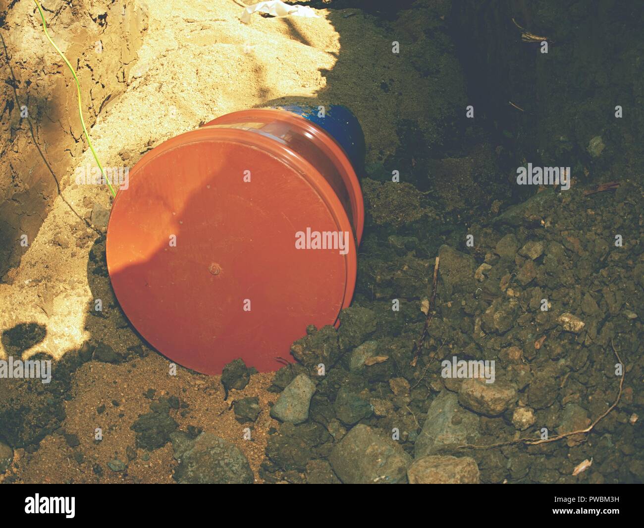 Laying of HDPE pipe underground of City portable water system. . Blue ...