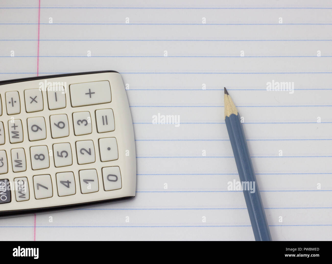 Gray pencil and calculator on white background, back to school ...