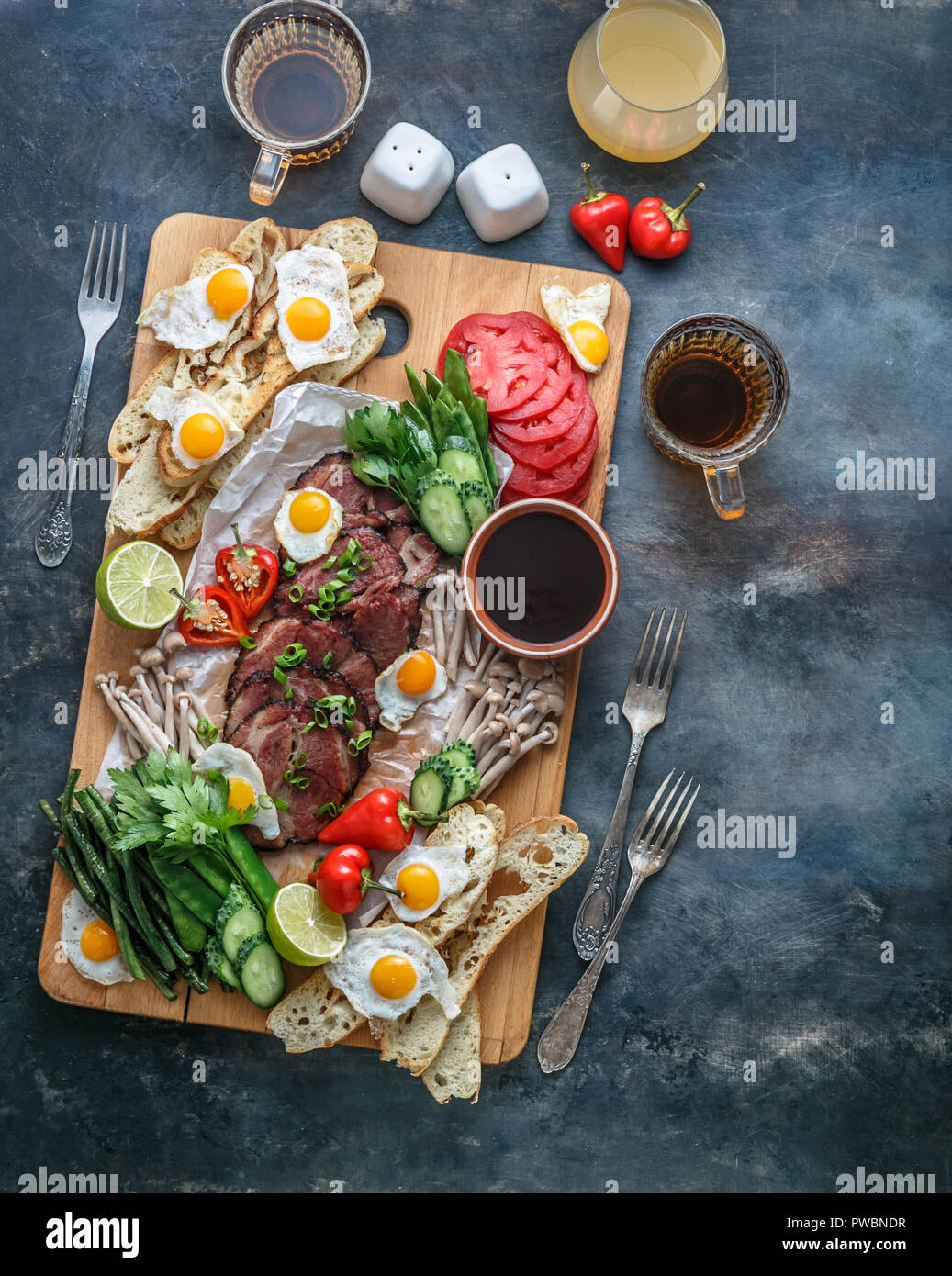 Assorted breakfast snacks on cutting board, top view copy space Stock ...