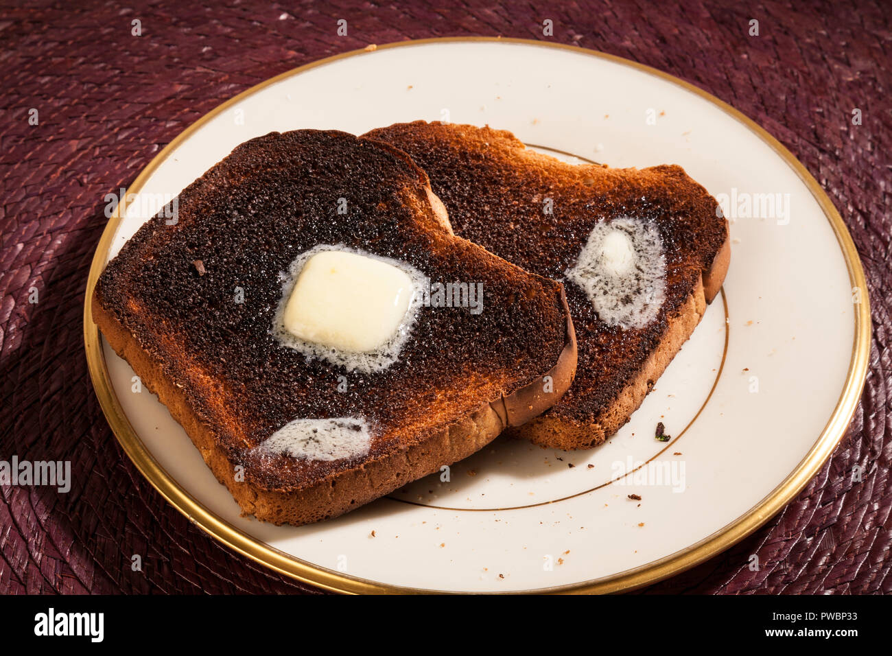 Slices of burned toast still life Stock Photo - Alamy