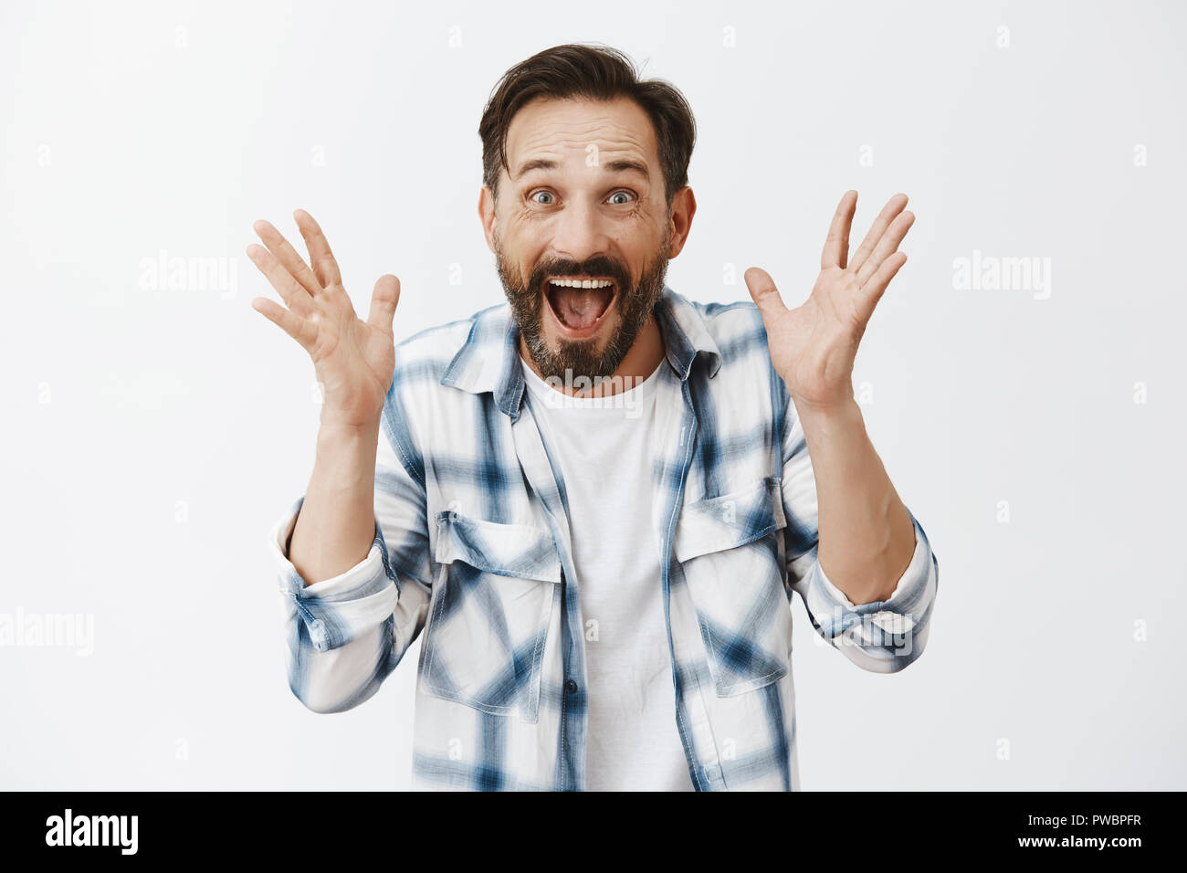 Happy mature male cannot control emotions, feeling happiness and joy ...