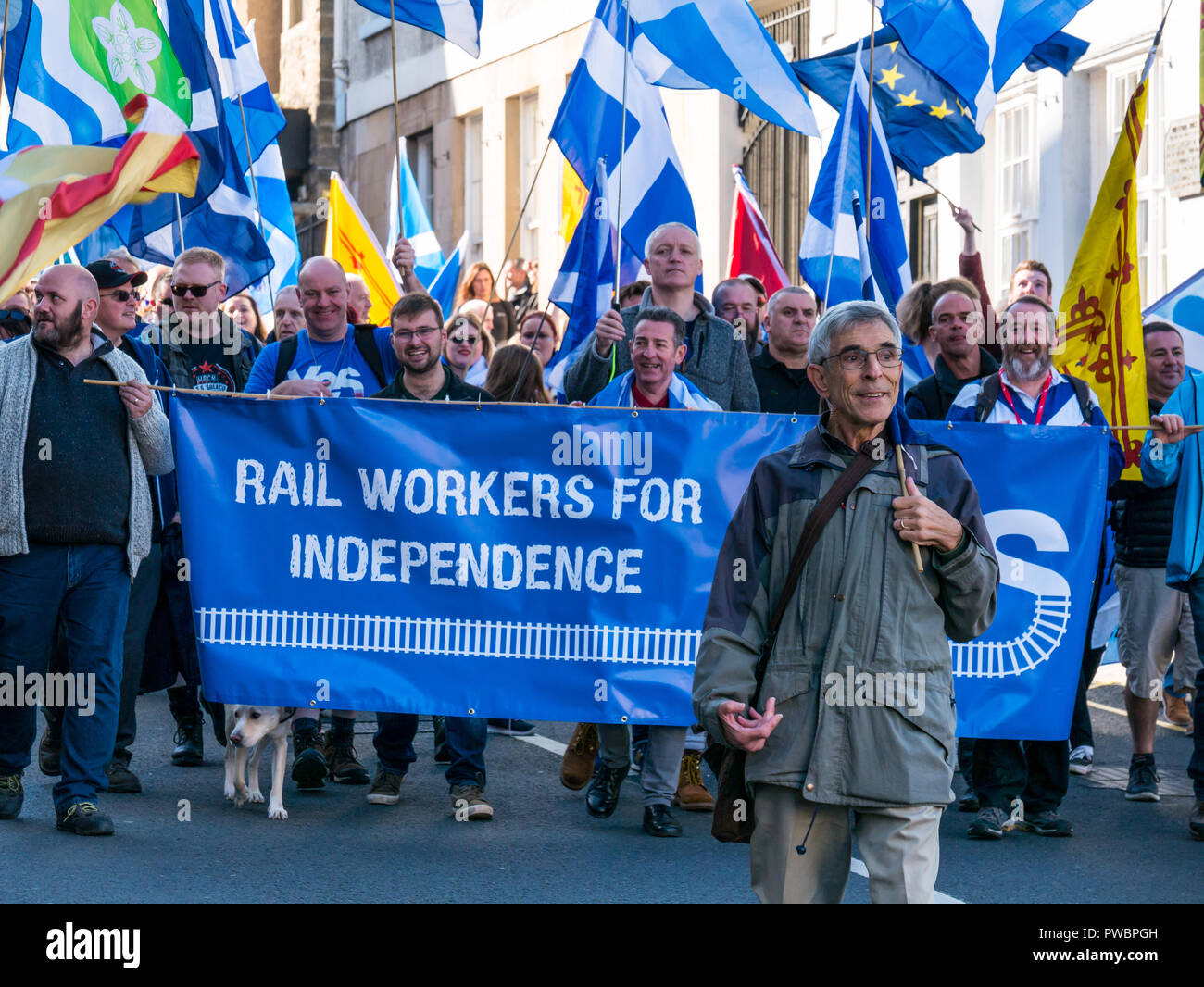 People marching with Rail Workers for Scottish Independence banner at ...