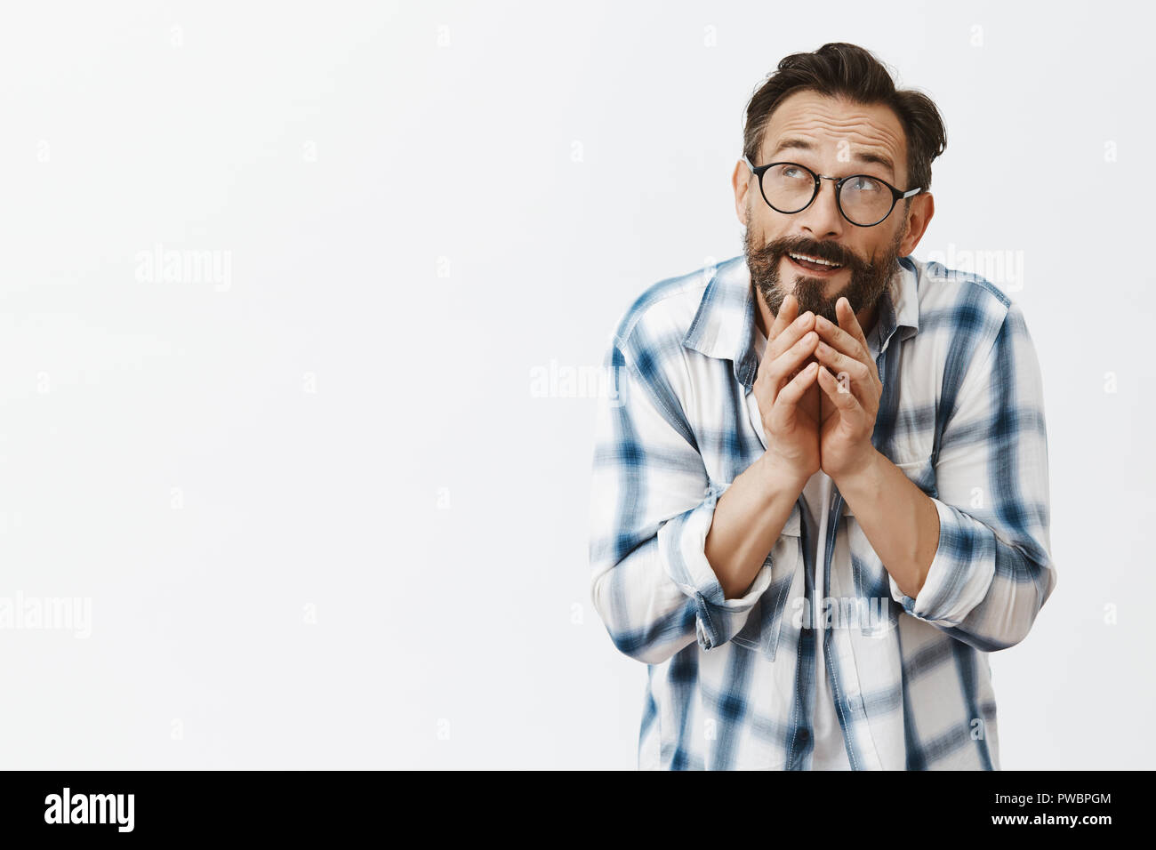Portrait of funny handsome mature dark-haired man with beard in fancy ...