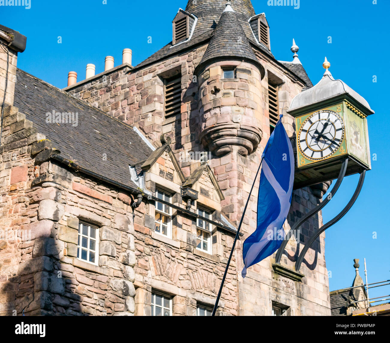 Tolbooth clock with St Andrew's Cross saltire Scottish flag during All ...