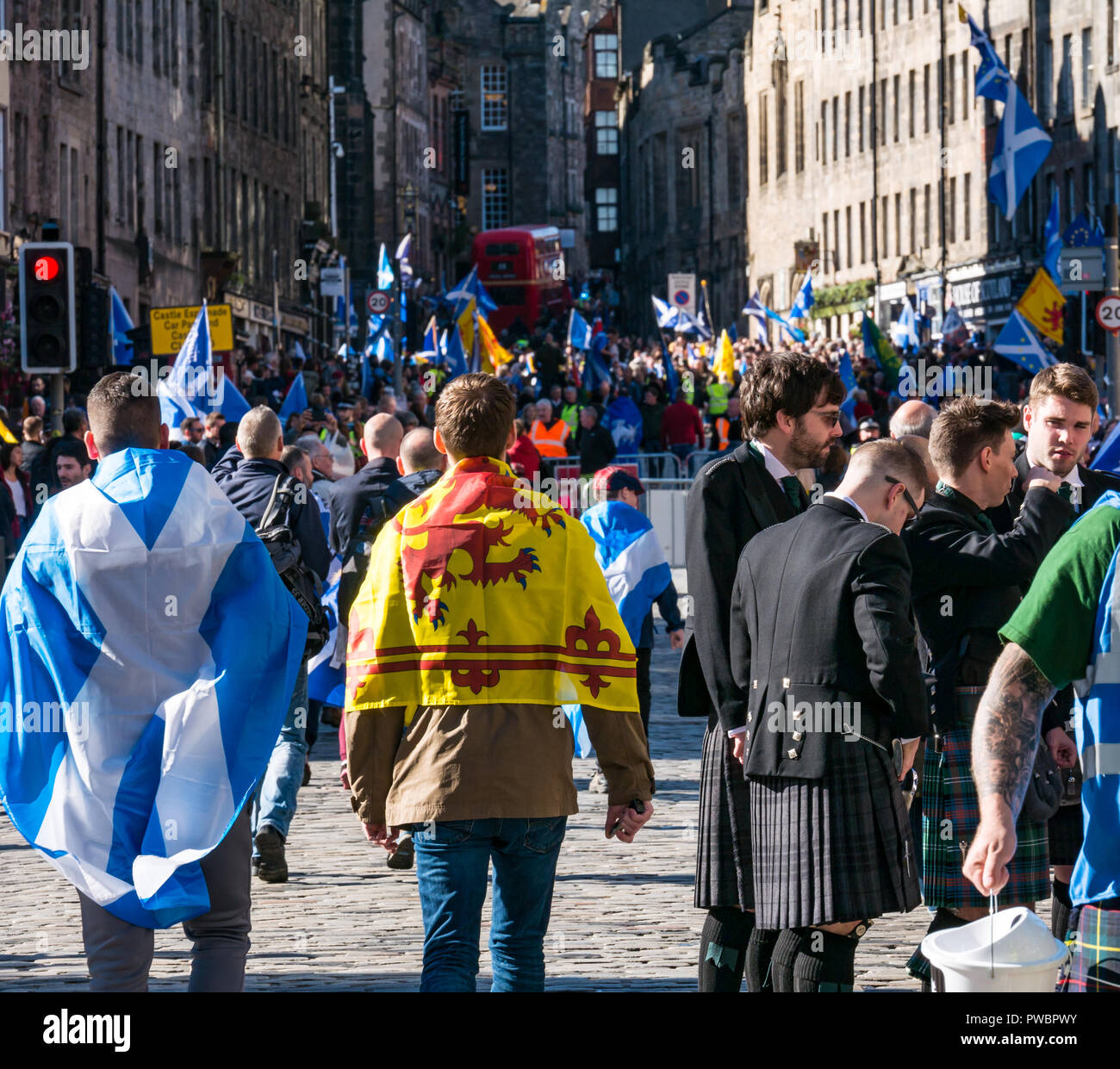 People draped with national flags and men in kilts at All Under One ...
