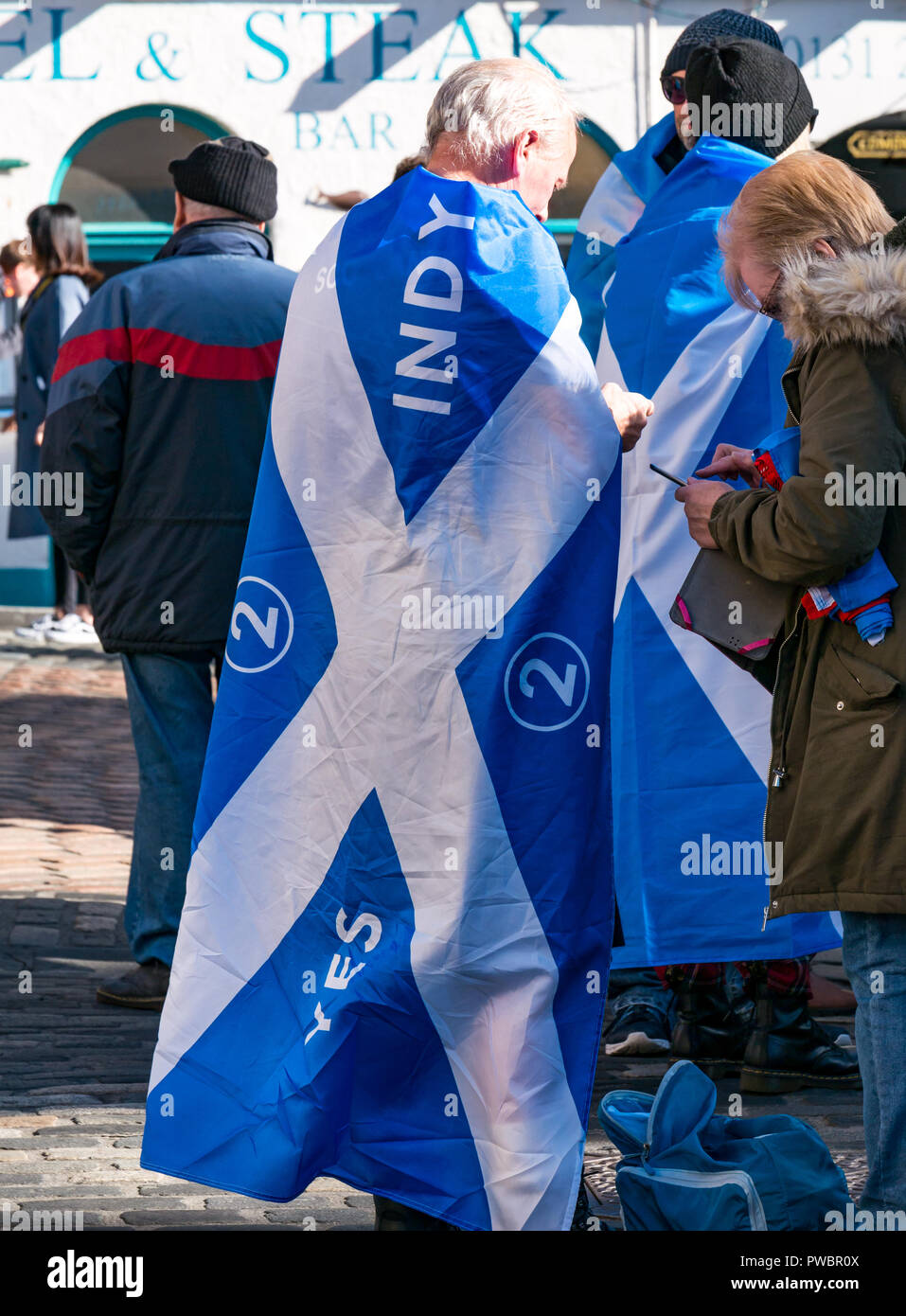 People draped with St Andrews cross flags joining All Under One Banner ...