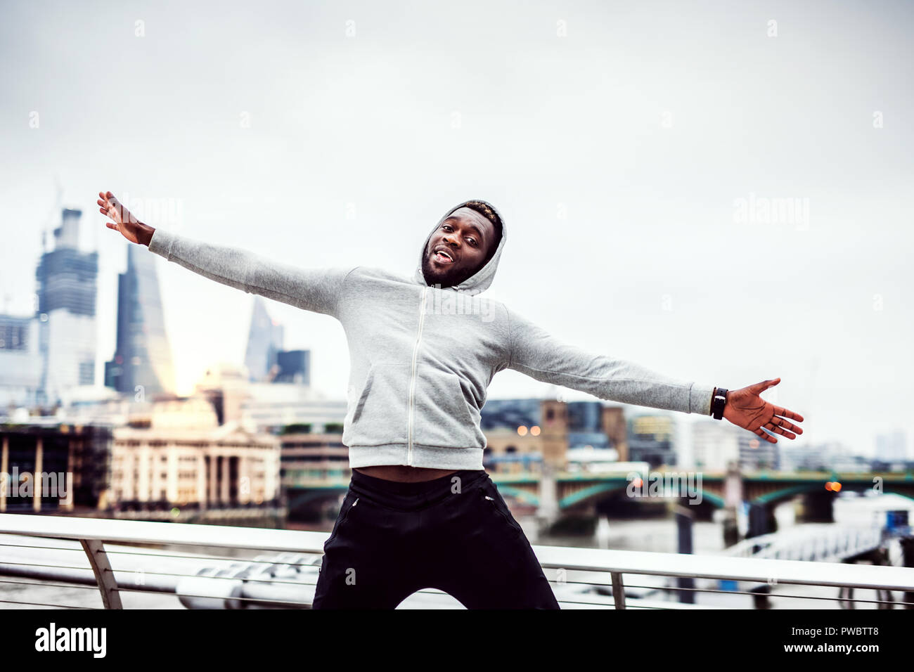 Boy arms out stretched hi-res stock photography and images - Alamy