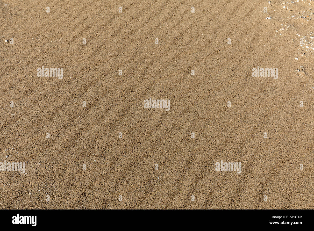 Sand ripple naturally formed by the low tide on the beach Stock Photo ...