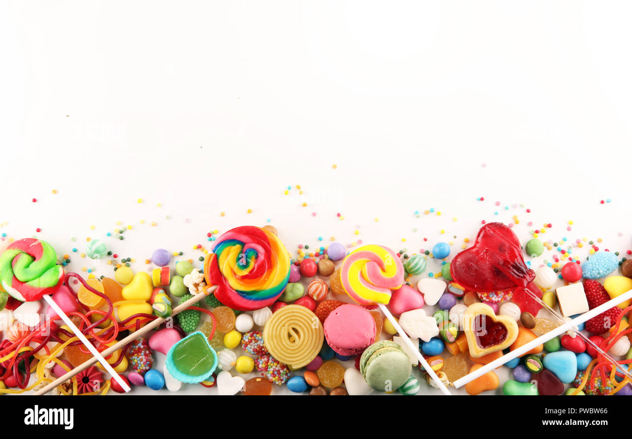 candies with jelly and sugar. colorful array of different childs sweets ...