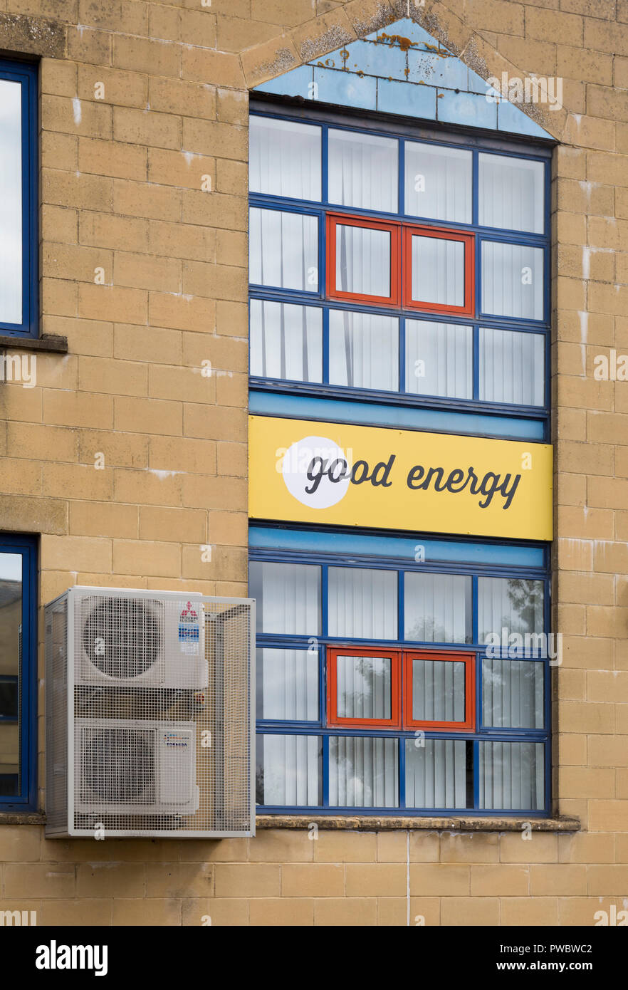 Good Energy sign and office building with air conditioning units ...