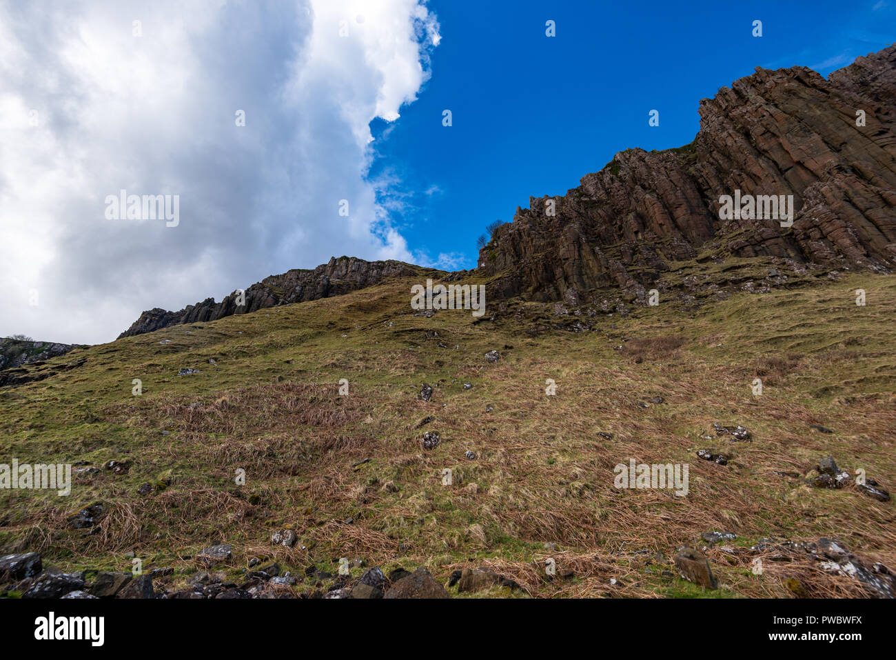 Steep cliffs at the shore near Kilt Rock and the Lealt Falls, Isle of ...