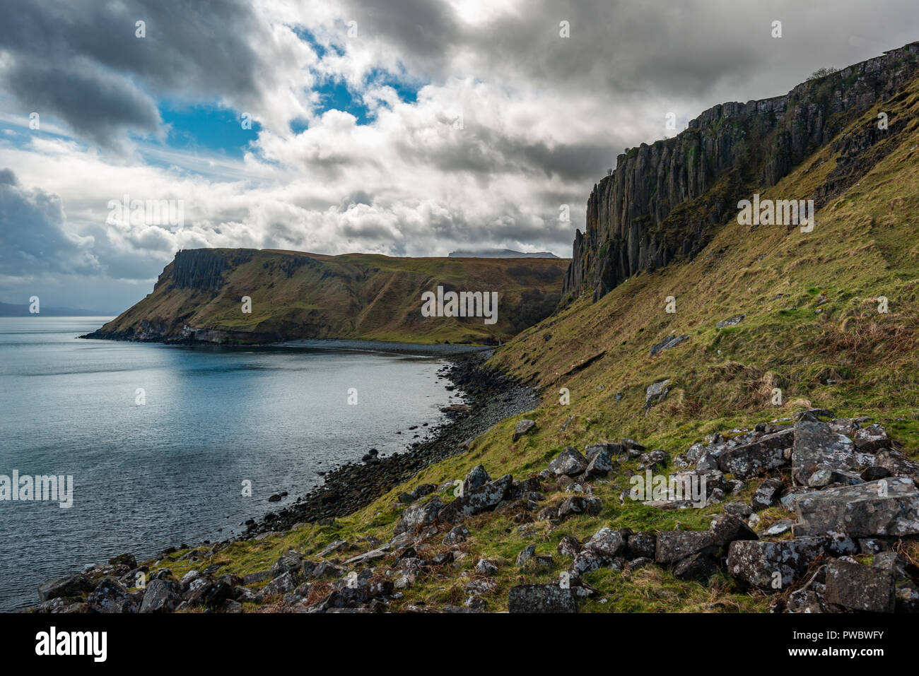Steep cliffs at the shore near Kilt Rock and the Lealt Falls, Isle of ...
