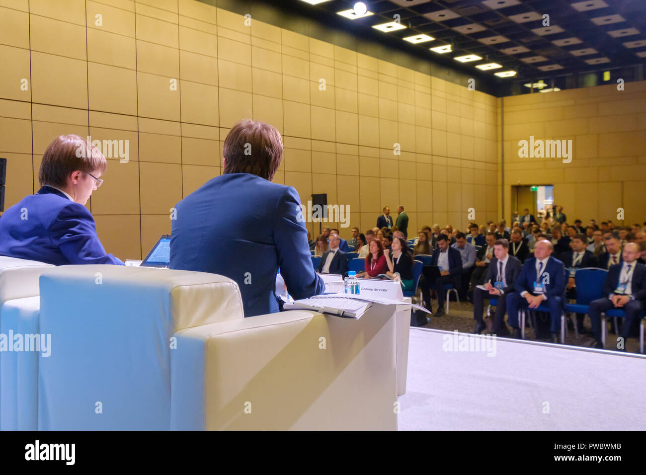 People attend business conference in congress hall Stock Photo - Alamy