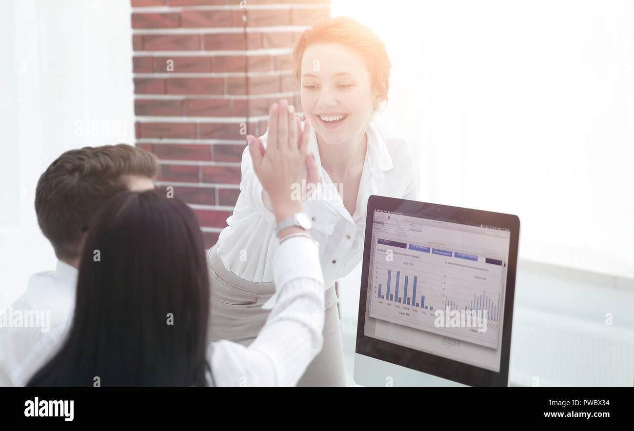 professional business team, giving each other "five Stock Photo - Alamy